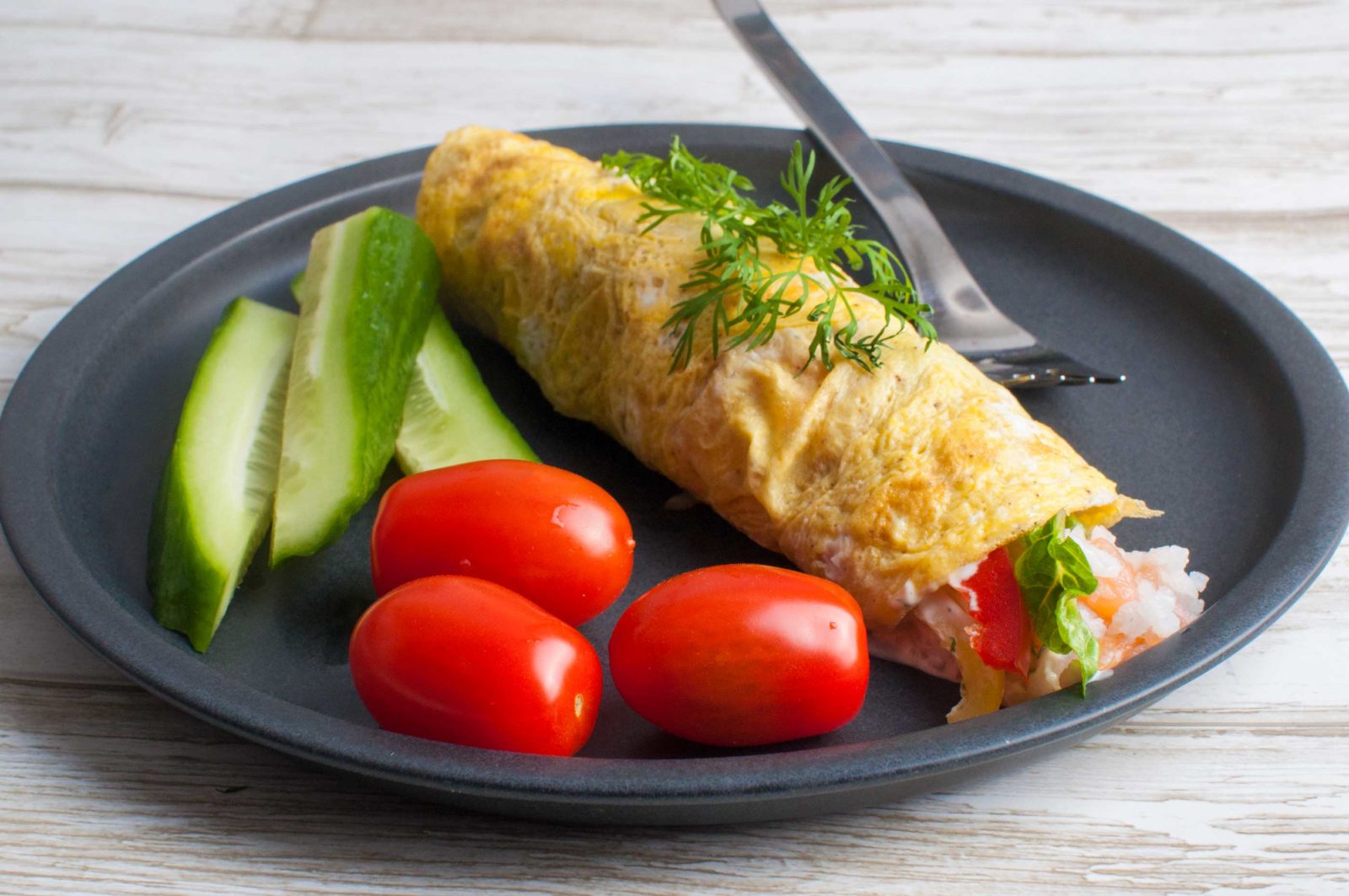 Quick And Easy Egg Wraps With Rice Salmon And Lots Of Veg