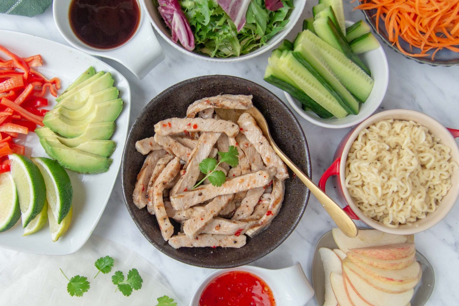 Fresh spring rolls with pork chops, noodles and lots of veg