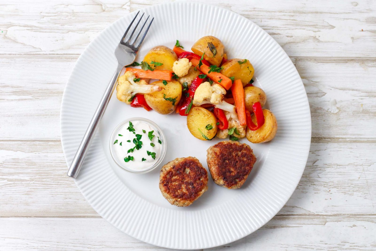 Easy duck meatballs with fried potatoes and veggies